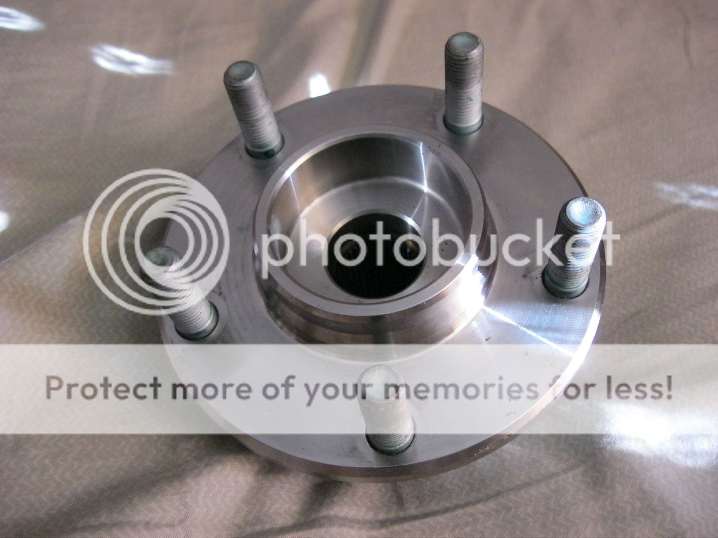 Detail Pictures of wheel hub/wheel bearing/CV splines | Mazda3 Forums